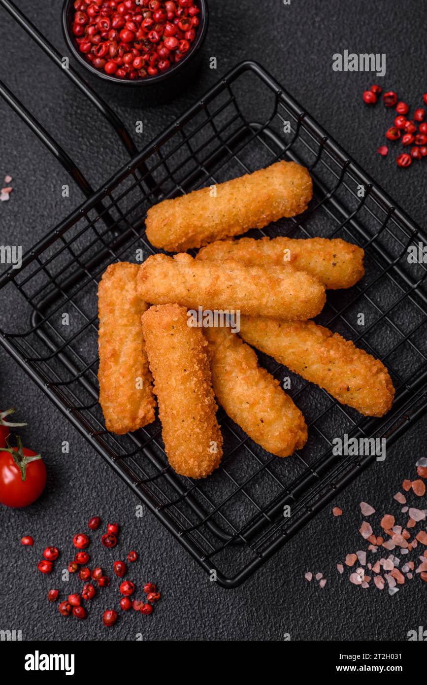 Delicious crispy cheese sticks with mozzarella, salt and spices ...