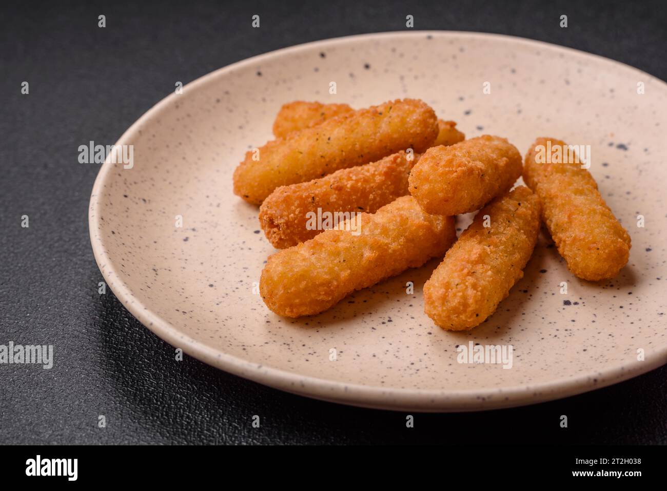 Delicious crispy cheese sticks with mozzarella, salt and spices ...