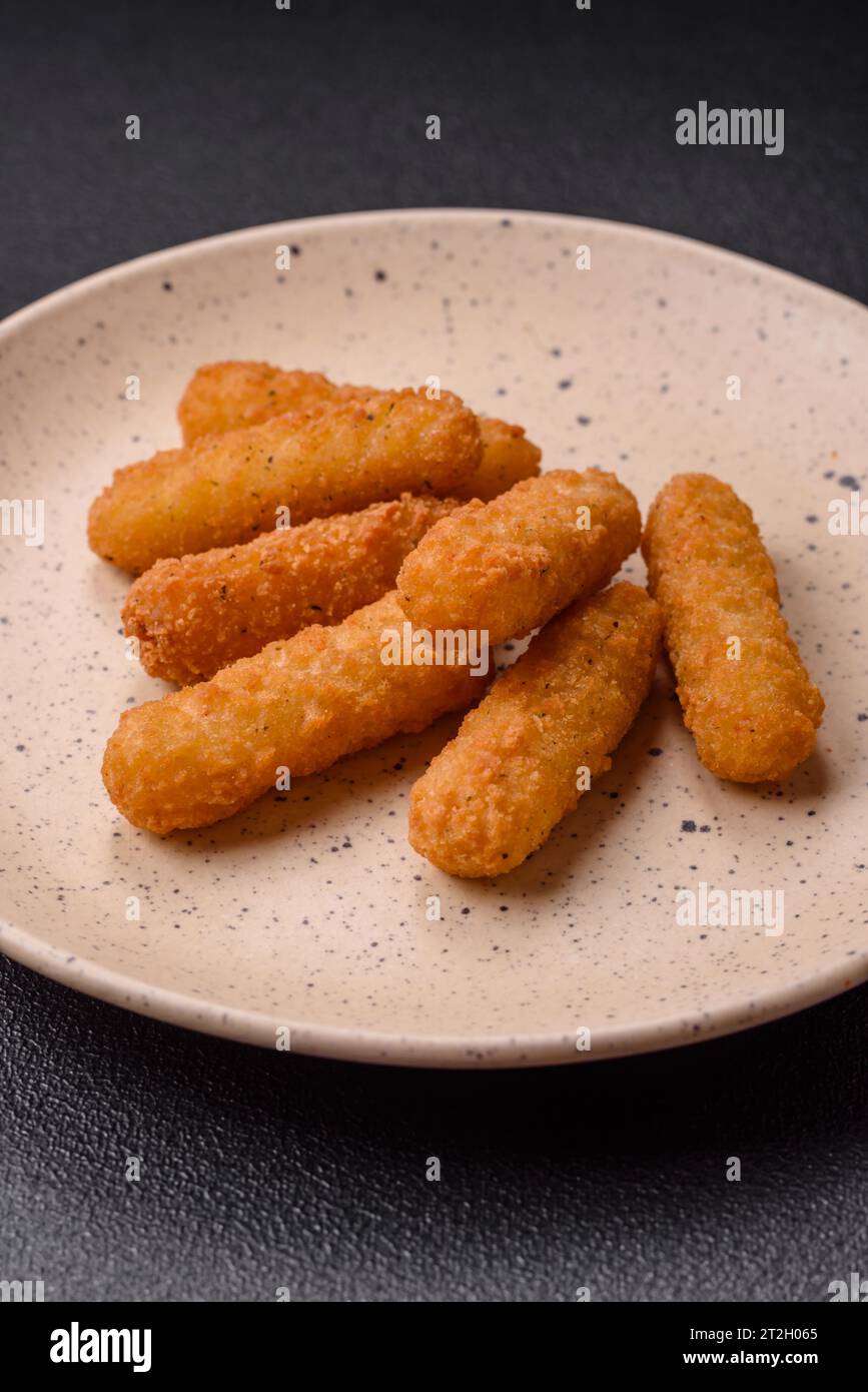 Delicious crispy cheese sticks with mozzarella, salt and spices ...