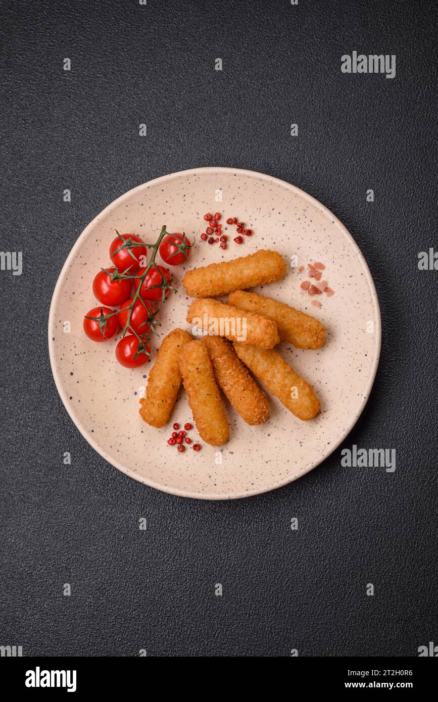 Delicious crispy cheese sticks with mozzarella, salt and spices ...