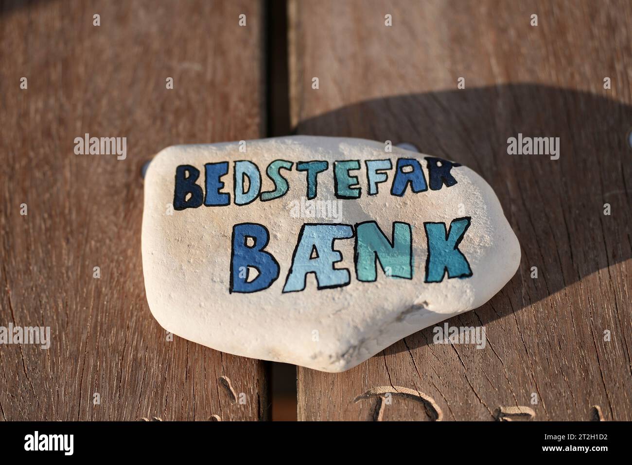 be happy is written on a rock, Message on the stone Stock Photo - Alamy