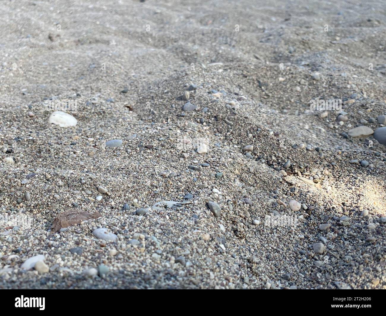 sandy background full frame, river sand from small stones of different ...