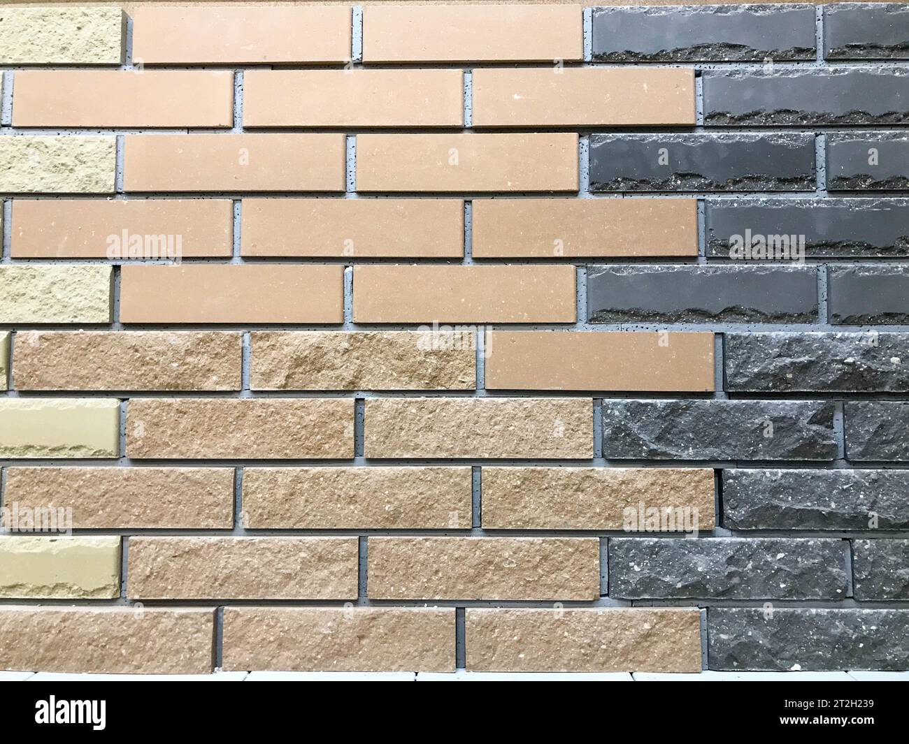 Beautiful texture of a decorative wall of two-tone building brown and ...