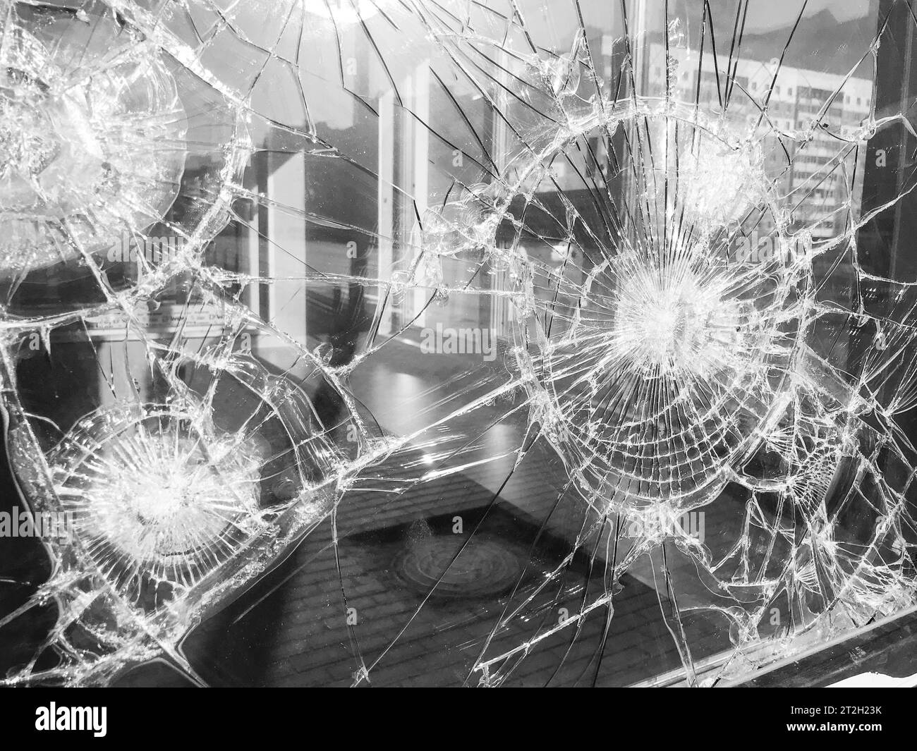 The texture of the broken cracked thick fragile broken sharp glass ...