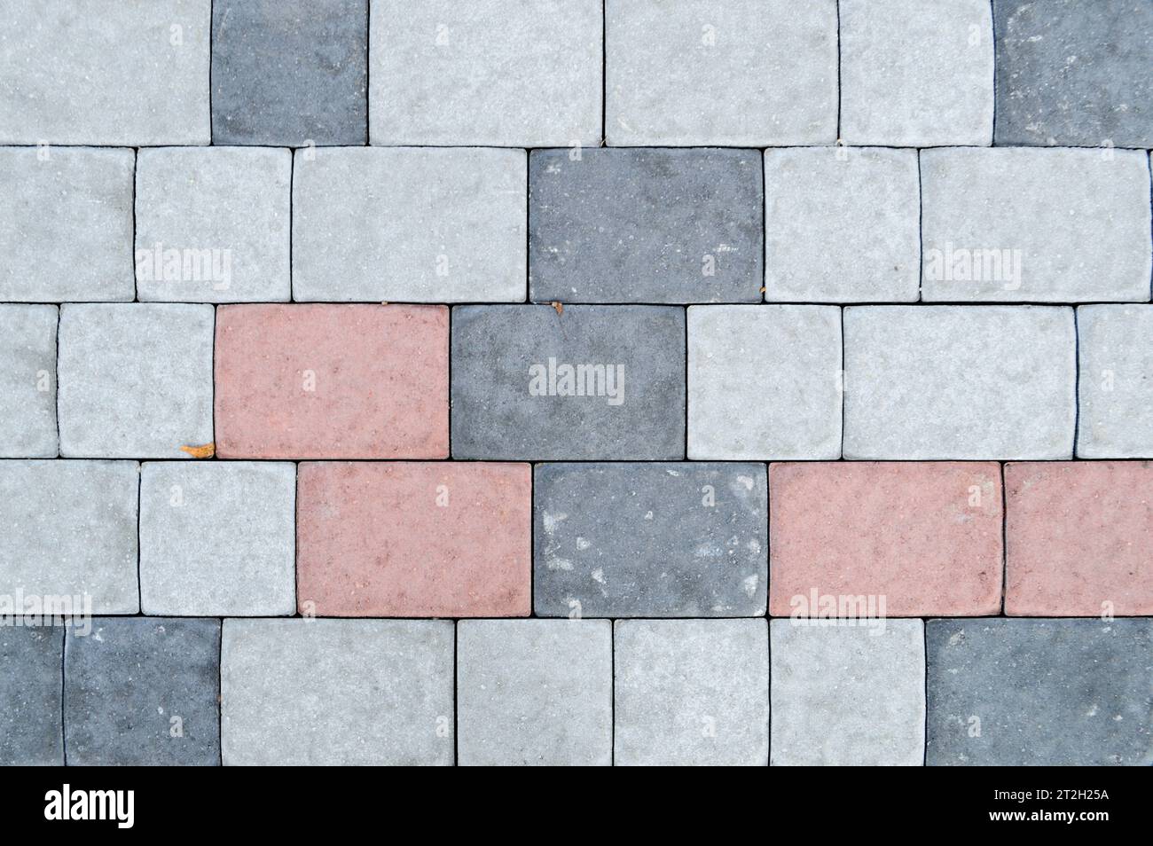 Texture of gray rectangular concrete stone paving slabs on the road ...