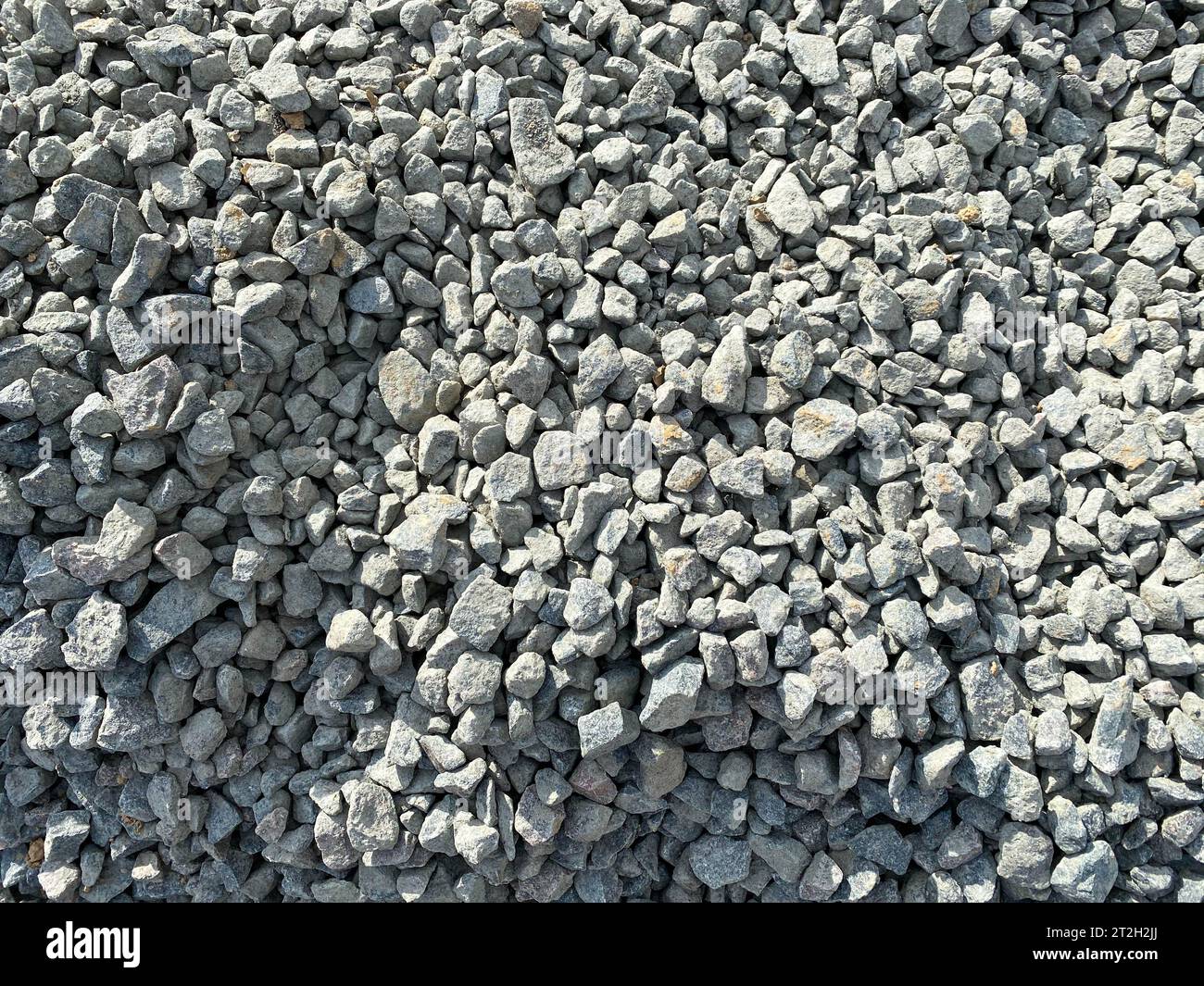 Abstract white crushed stones texture background. Gray rubble ...