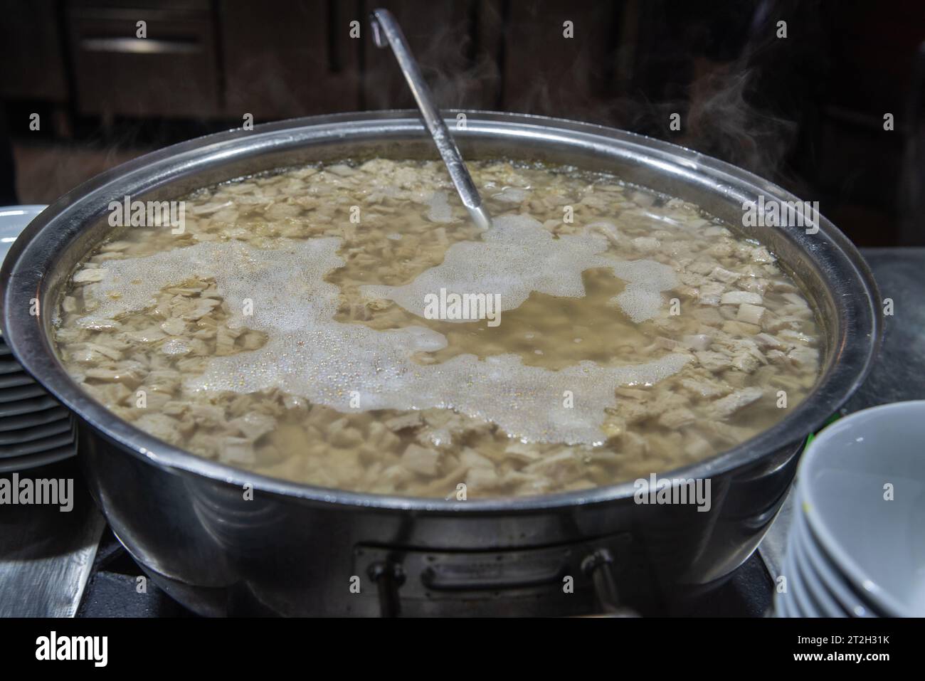 Pot of kelle paca soup at a restaurant in Turkey Stock Photo - Alamy