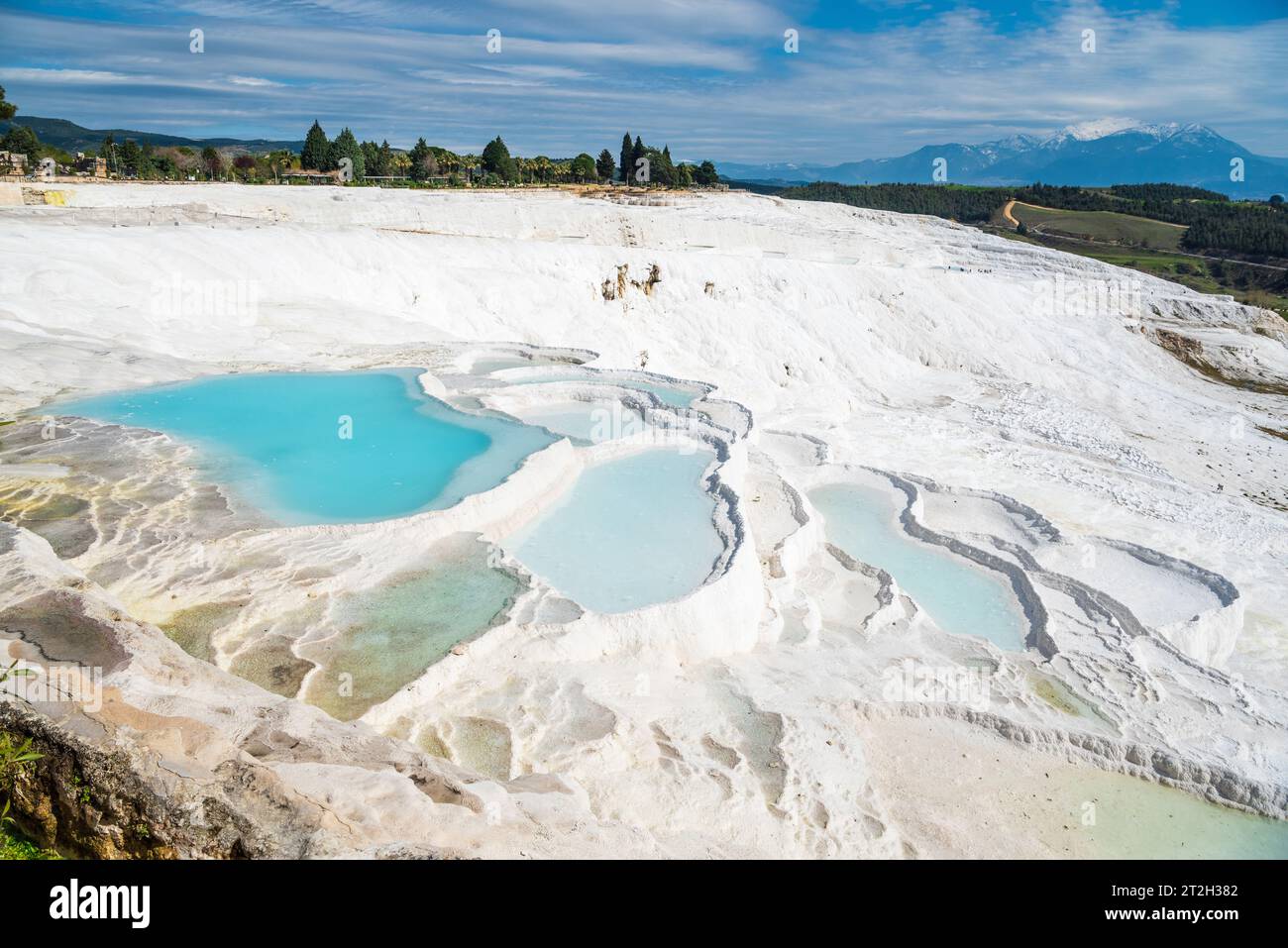 White terraces (natural travertine formations and hot pools) in ...