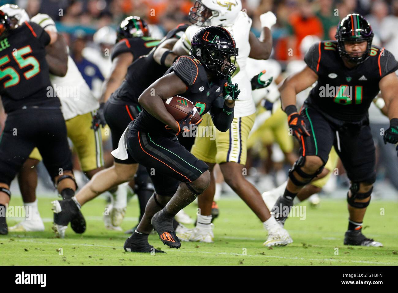 Miami Hurricanes running back Donald Chaney Jr. (2) runs with the ball ...