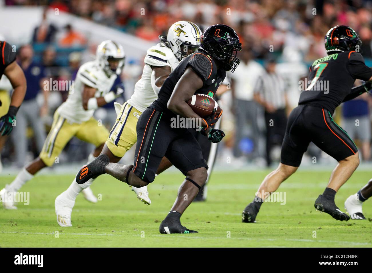 Miami Hurricanes running back Donald Chaney Jr. (2) runs with the ball ...