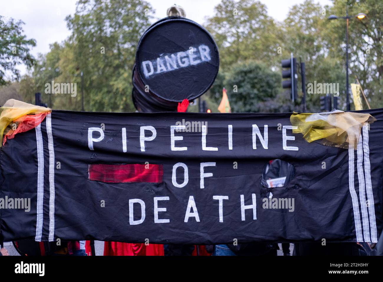 'Pipeline of death' placard and prop is carried to oil and gas summit ...