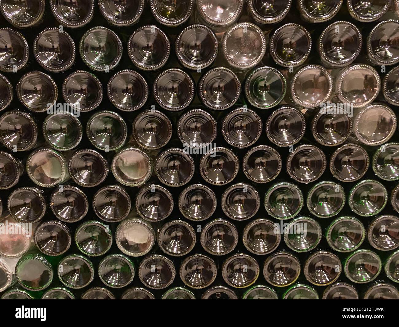 Bottoms of wine bottles as background, closeup Stock Photo - Alamy