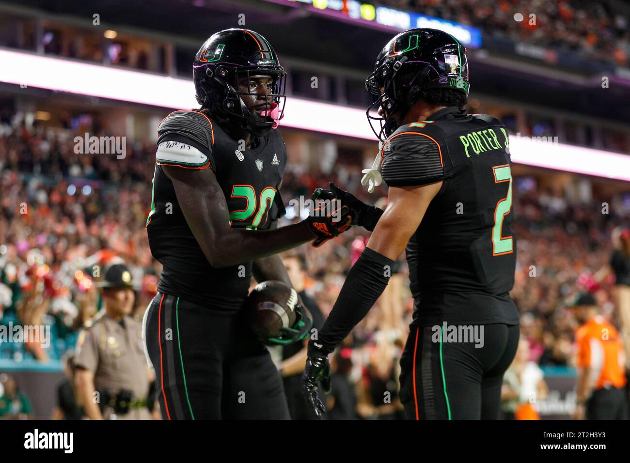 Miami Hurricanes safety James Williams (20) celebrates with defensive ...