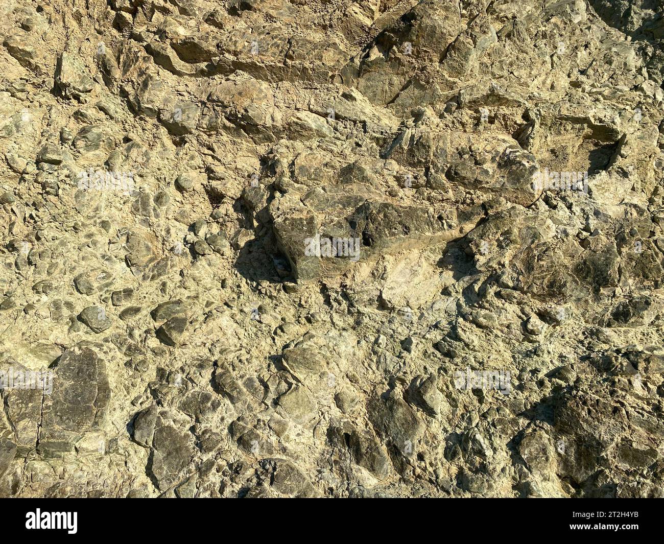 Rock texture. Stone background. Old weathered crumbling mountain ...