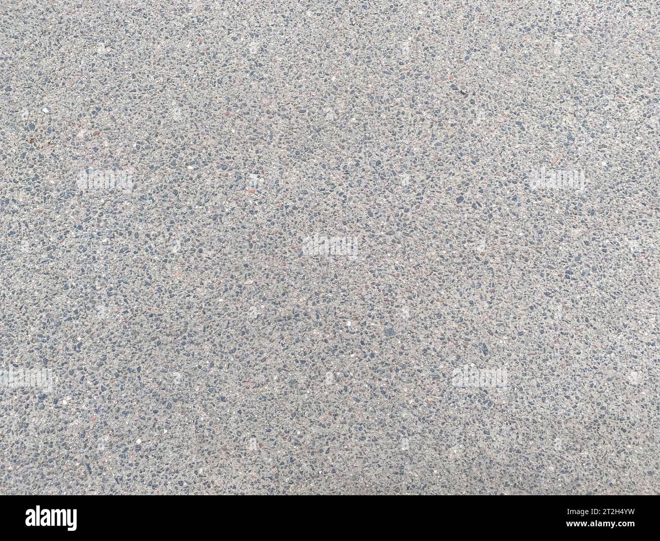 Gray new solid road asphalt with small stones. The background. Texture ...