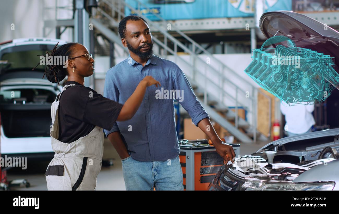 Certified technician in repair shop using holographic augmented reality ...