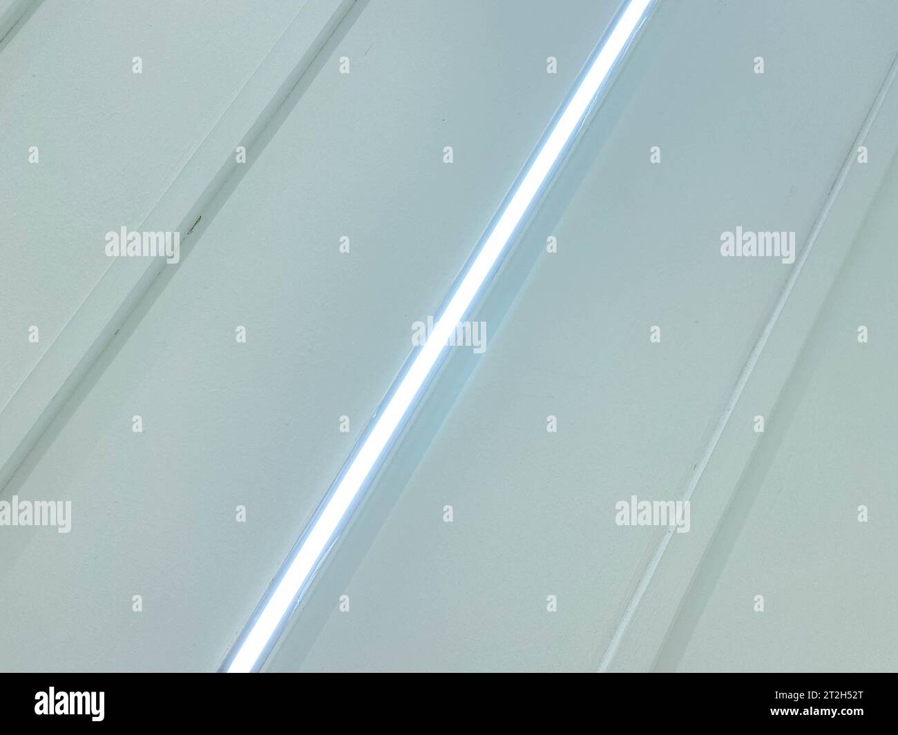 in the ceiling, a white lamp creates a pleasant soft light. plastic ...