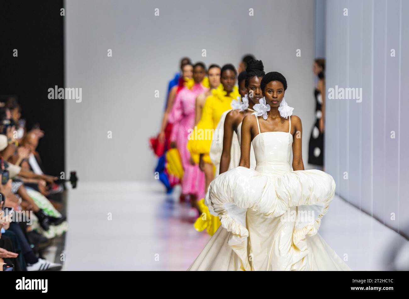Johannesburg, South Africa. 19th Oct, 2023. Models present creations of ...