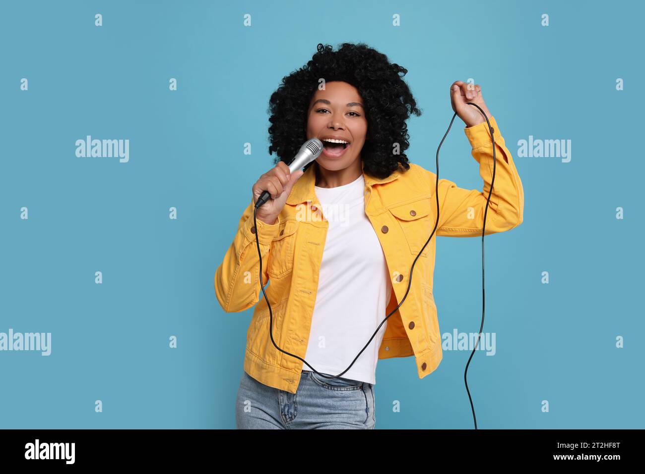 Female singer emotionally singing microphone hi-res stock photography ...