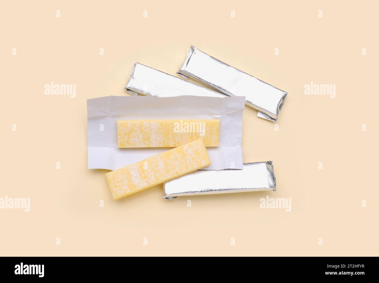 Sticks of tasty chewing gum on beige background, flat lay Stock Photo ...