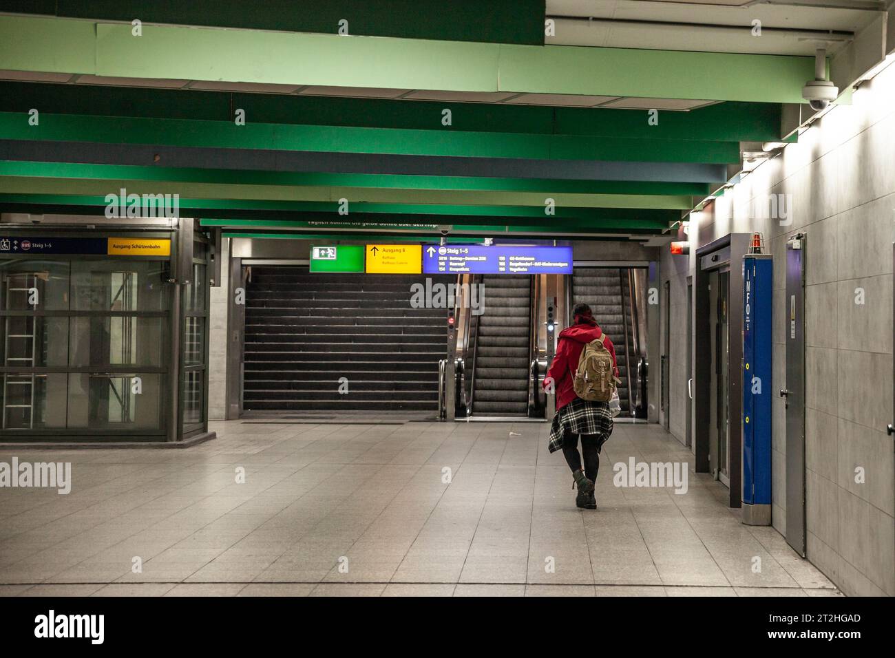 Picture of a woman walking at night alone in a station of Essen ...