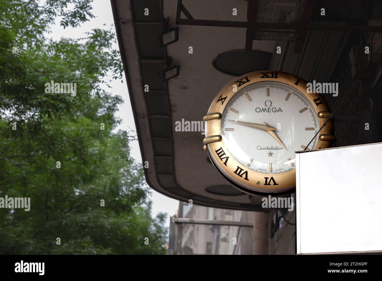 Picture of a sign with the logo of Omega in front of the Omega Boutique ...