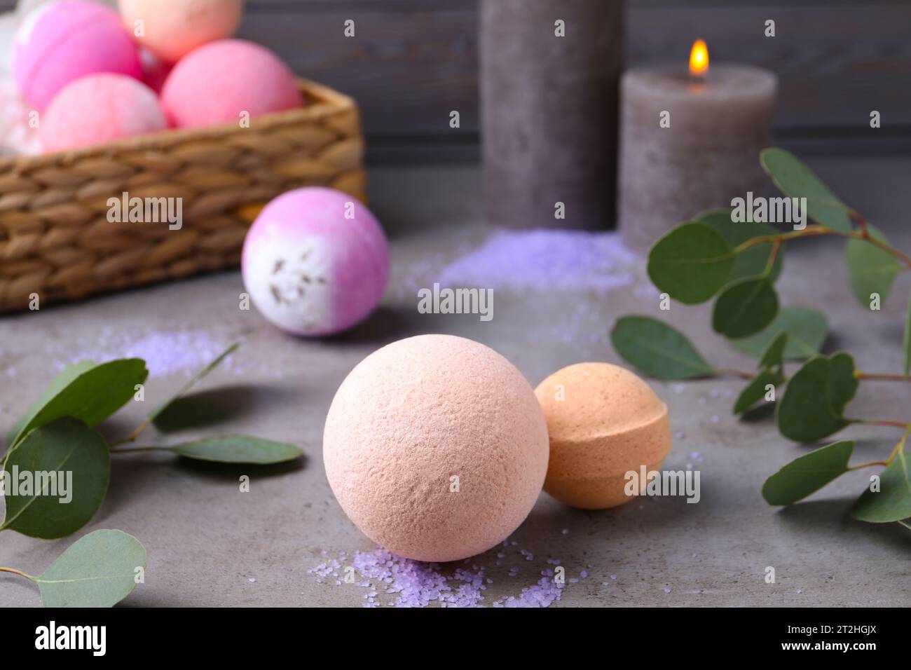 Beautiful composition with aromatic bath bombs on grey table Stock ...