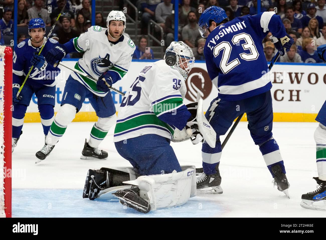 Tampa Bay Lightning center Michael Eyssimont (23) tries to deflect the ...