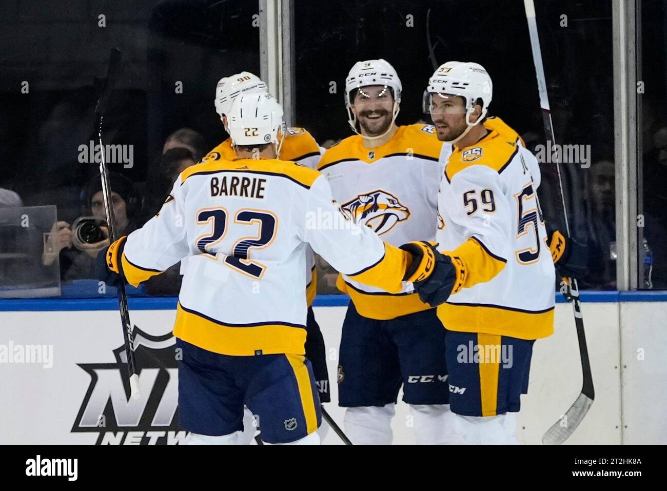 Nashville Predators' Filip Forsberg (9) celebrates with teammates Tyson ...