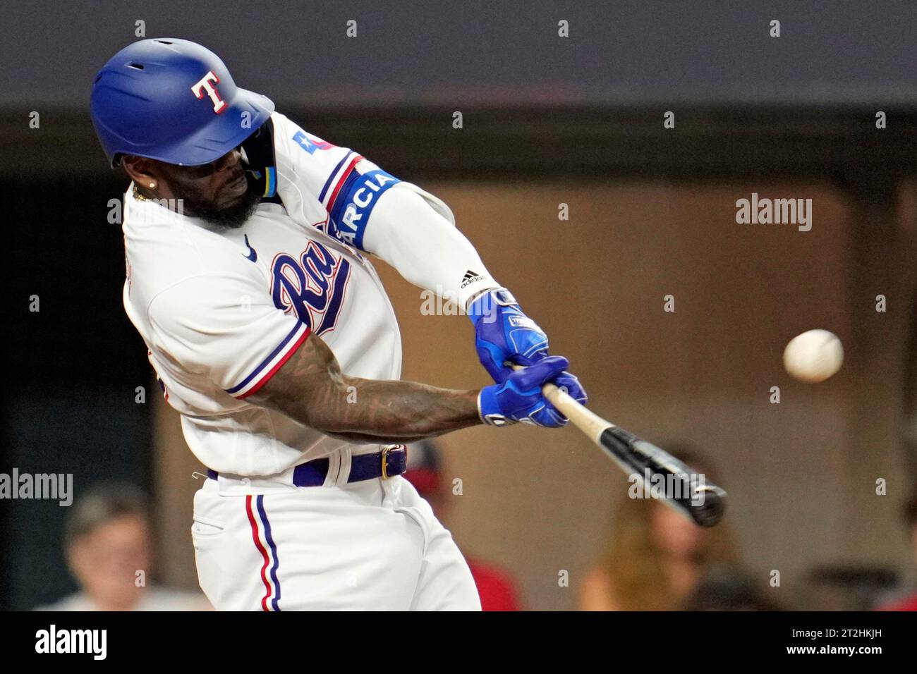Texas Rangers' Adolis Garcia hits a home run against the Houston Astros ...