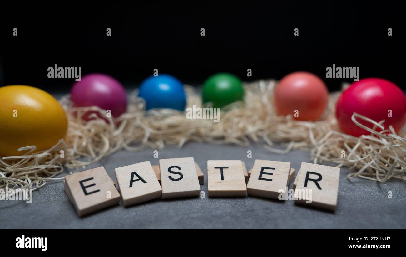 Happy Easter! The Easter eggs are colored and lying in the straw ...