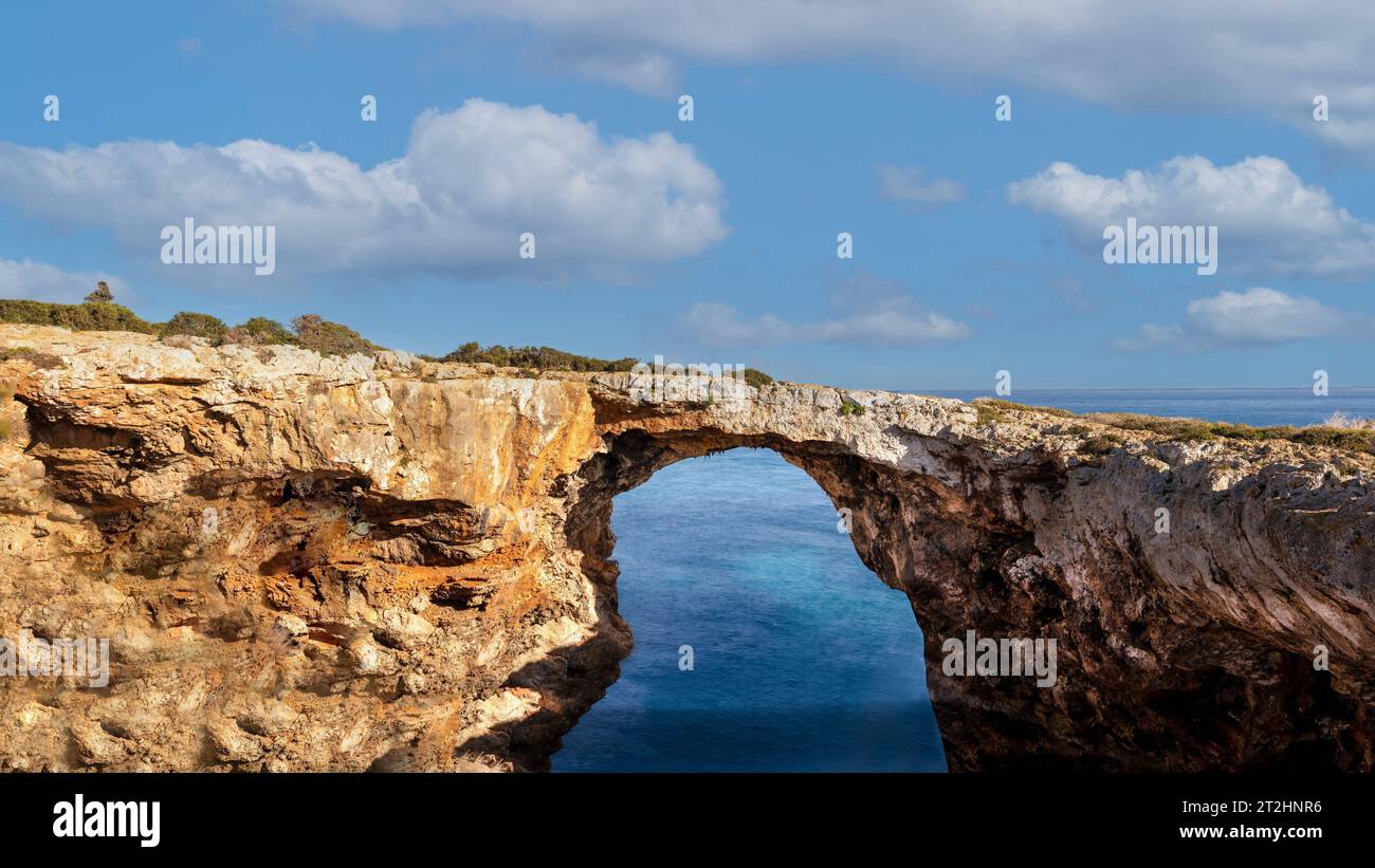 Stone arch in the Bay of Cala Varques, Mallorca, Spain Stock Photo - Alamy
