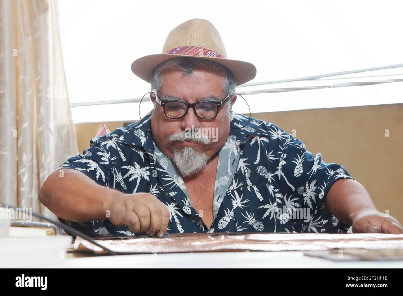 Copper artisan working Stock Photo - Alamy