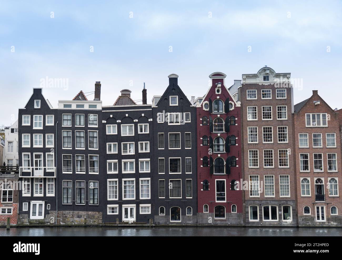 Facades in Amsterdam. Old buildings bathed in natural daylight Stock ...