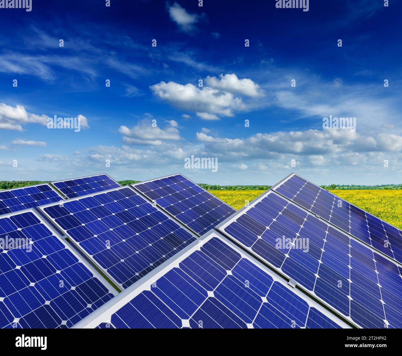 Solar battery panels in rural meadow field Stock Photo - Alamy