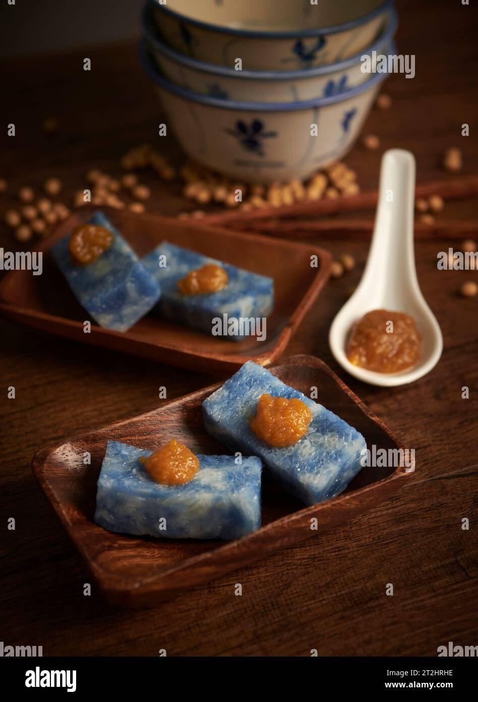 Selective focus image of Nyonya kuih “Kaya Kuih” (Blue Glutinous Rice ...