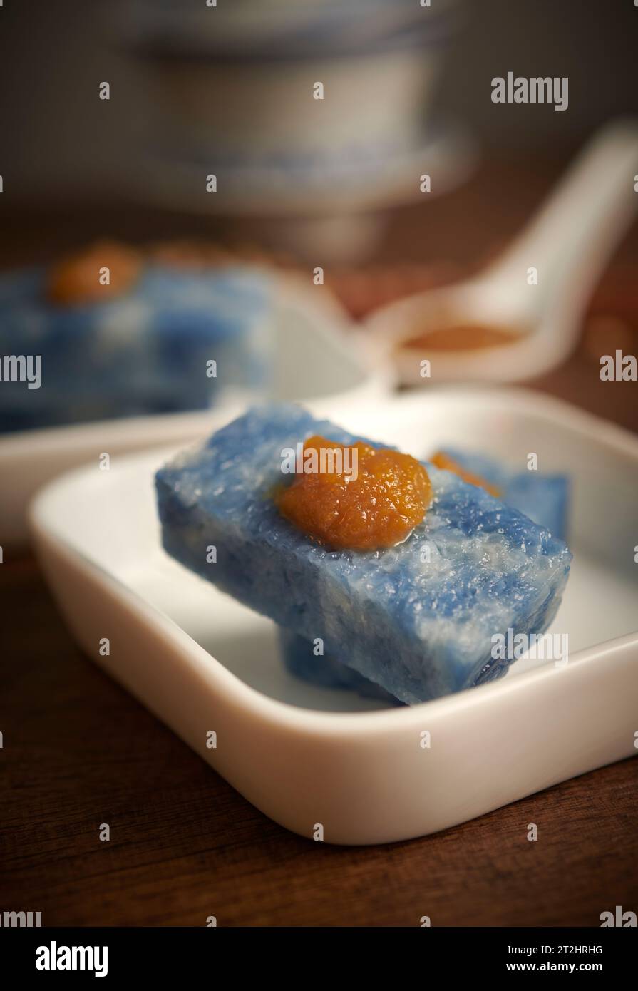 Selective focus image of Nyonya kuih “Kaya Kuih” (Blue Glutinous Rice ...