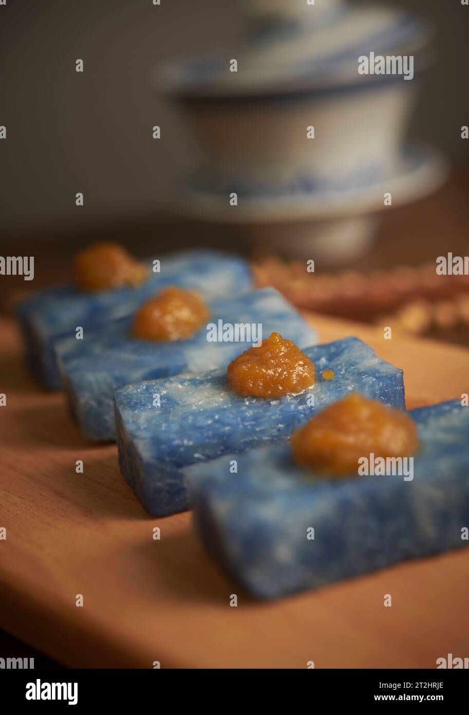 Selective focus image of Nyonya kuih “Kaya Kuih” (Blue Glutinous Rice ...
