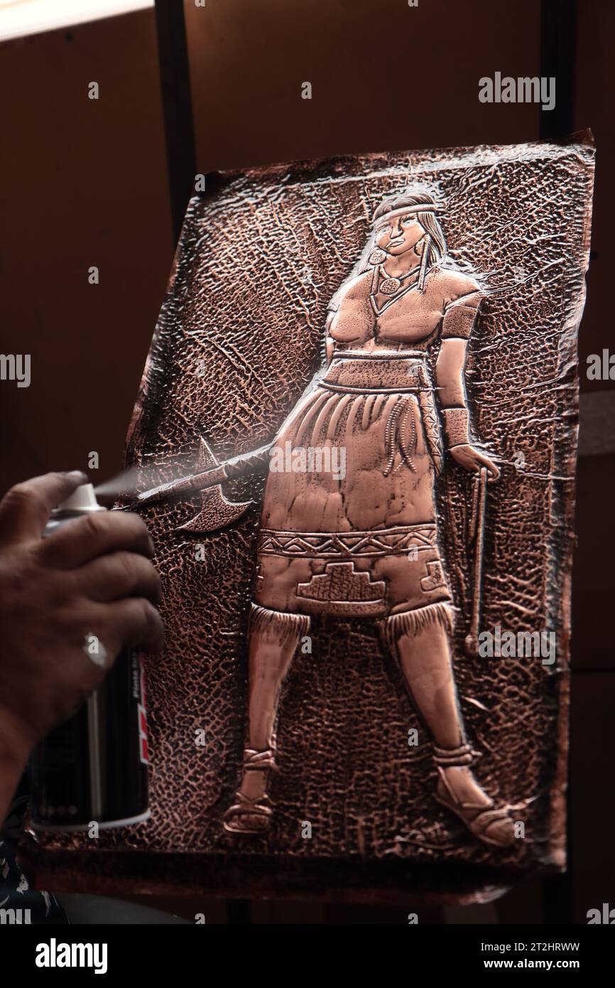 Hand-engraved copper sheet featuring an Inca woman design, lacquer ...
