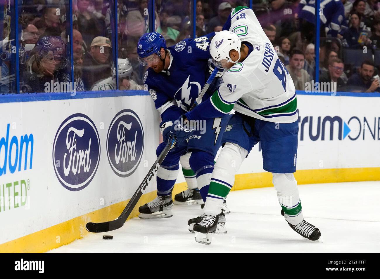 Tampa Bay Lightning defenseman Nick Perbix (48) battles with Vancouver ...