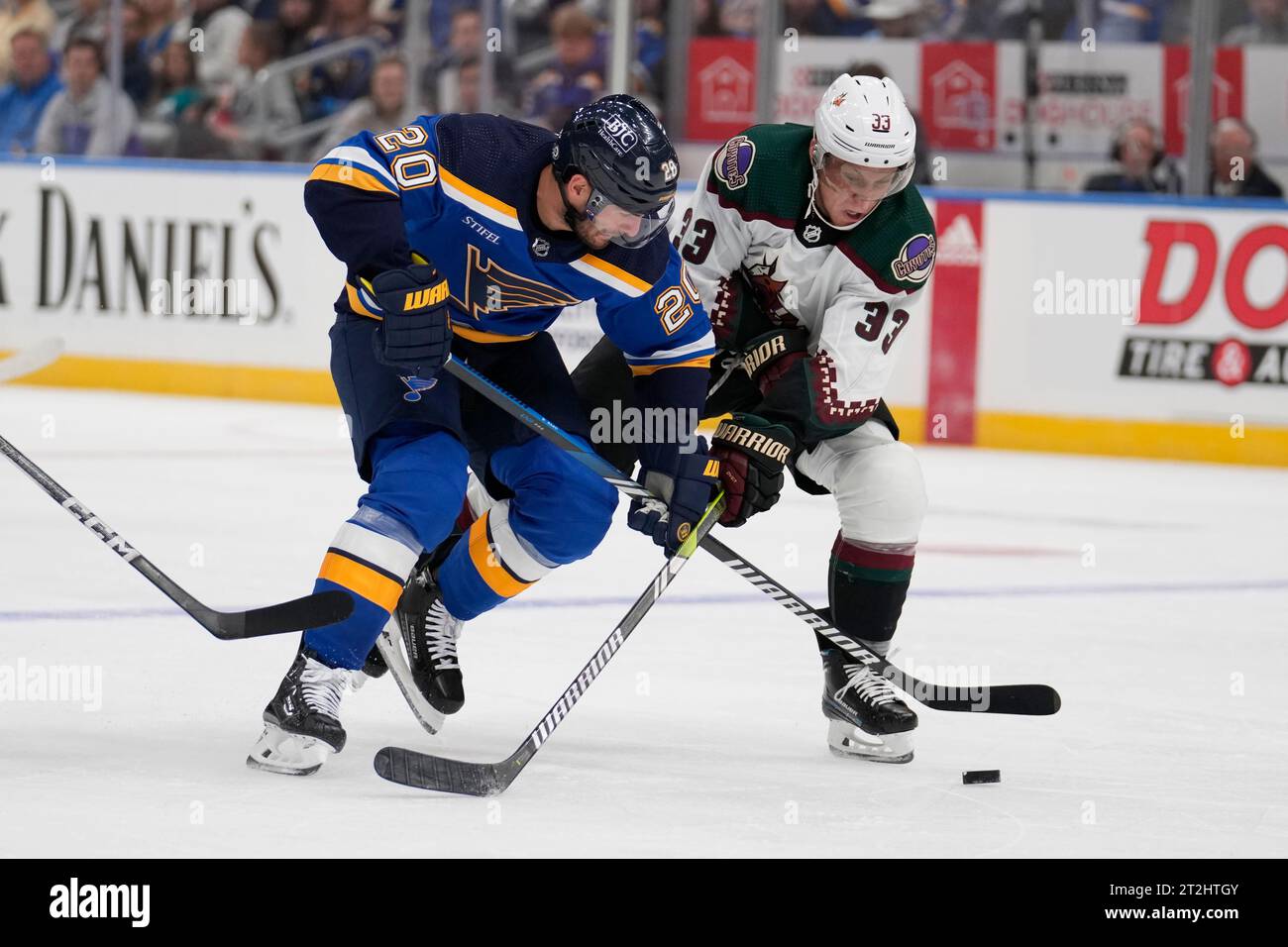 St. Louis Blues' Brandon Saad (20) and Arizona Coyotes' Travis Dermott ...