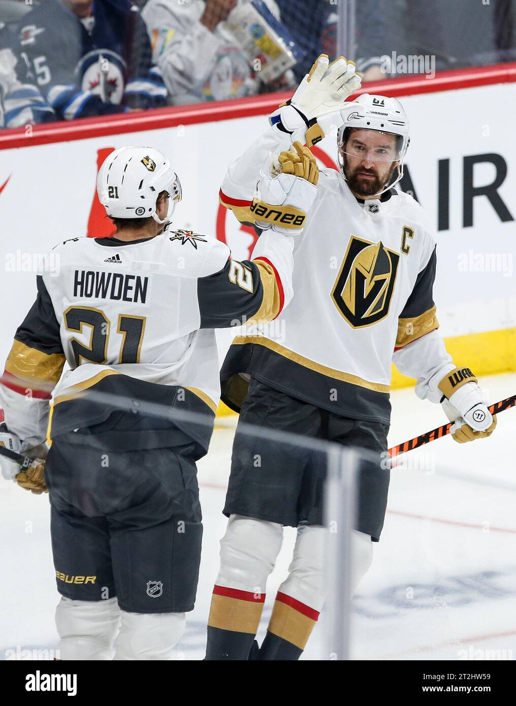 Vegas Golden Knights' Brett Howden (21) and Mark Stone (61) celebrate ...