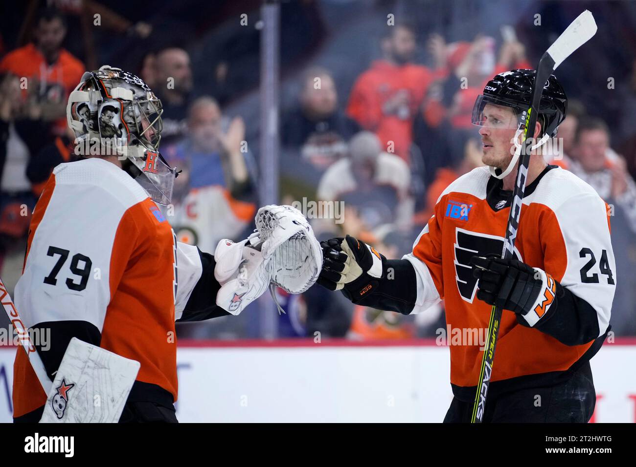 Philadelphia Flyers' Nick Seeler, right, and Carter Hart celebrate ...