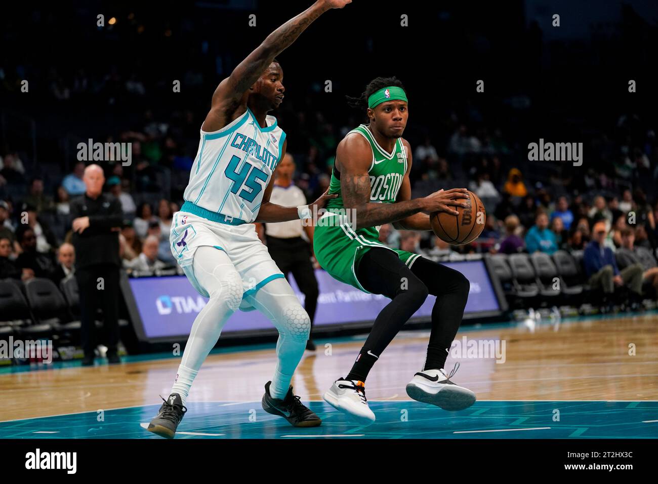Charlotte Hornets guard Edmond Sumner, left, defends against Boston ...