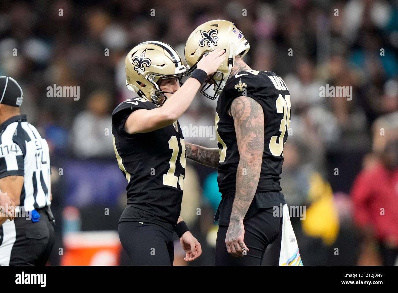 New Orleans Saints place kicker Blake Grupe, left, celebrates his field ...
