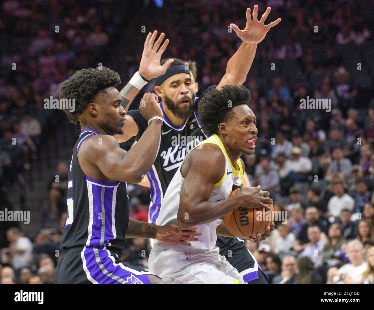 Utah Jazz guard Collin Sexton, right, drives past Sacramento Kings ...