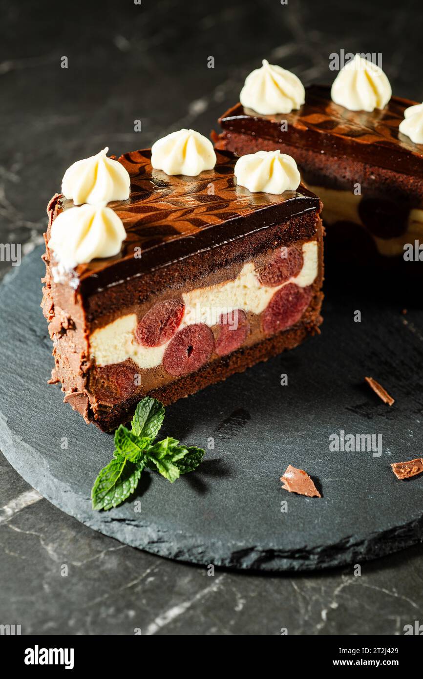 Black forest gateaux cake with chocolate Genoese sponge, creamy ganache ...