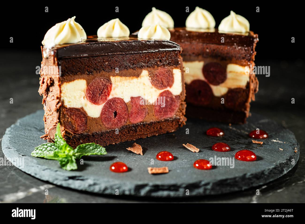Black forest gateaux cake with chocolate Genoese sponge, creamy ganache ...