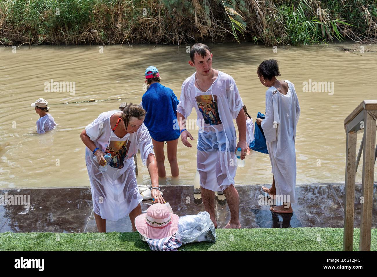 Qasr el Yahud, West Bank - August 13, 2023: Pilgrims baptize in Qasr el ...