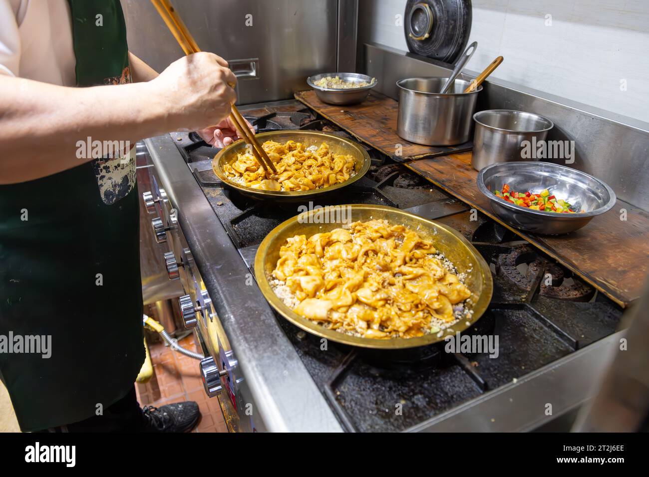 Professional chef frying fish hi-res stock photography and images - Alamy